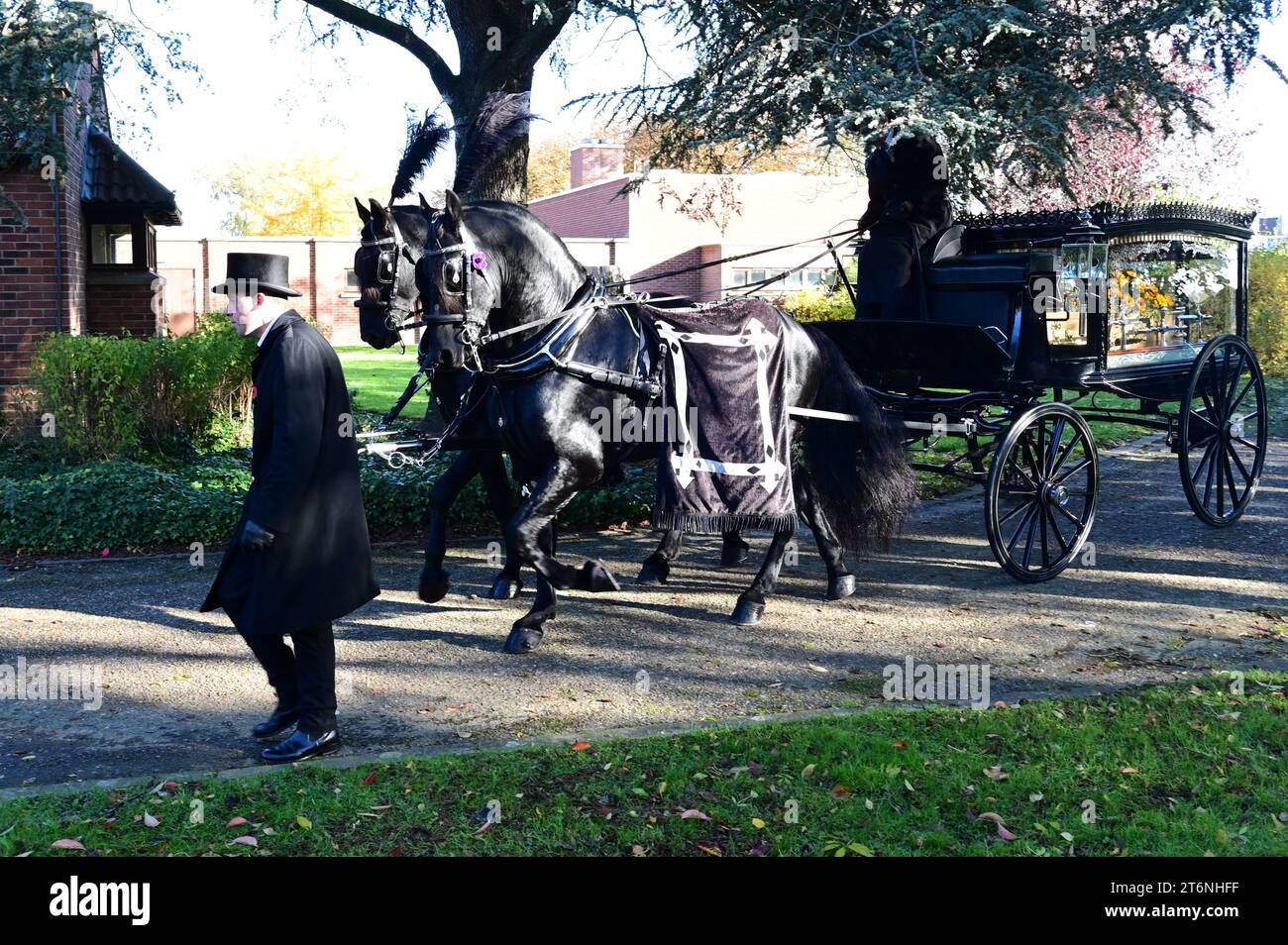 A horse drawn funeral carriage pulled by black horses Stock Photo - Alamy
