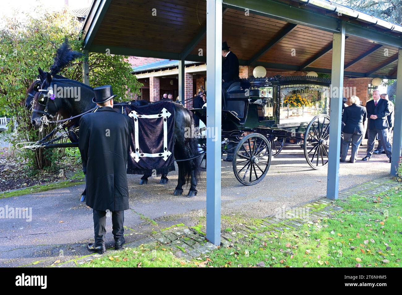 A horse drawn funeral carriage pulled by black horses Stock Photo - Alamy