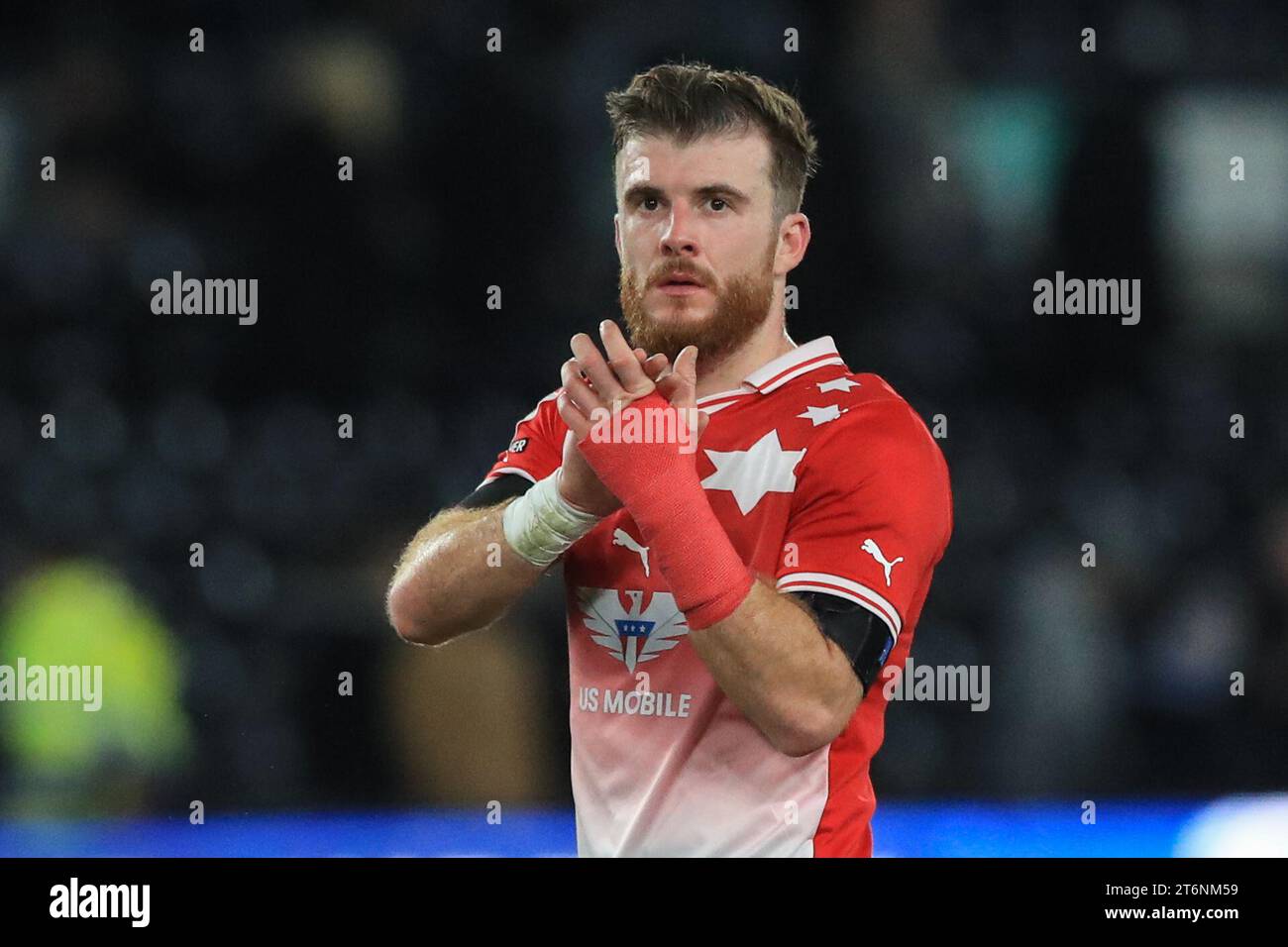 Nicky Cadden #7 of Barnsley applauds the travelling fans during the Sky ...