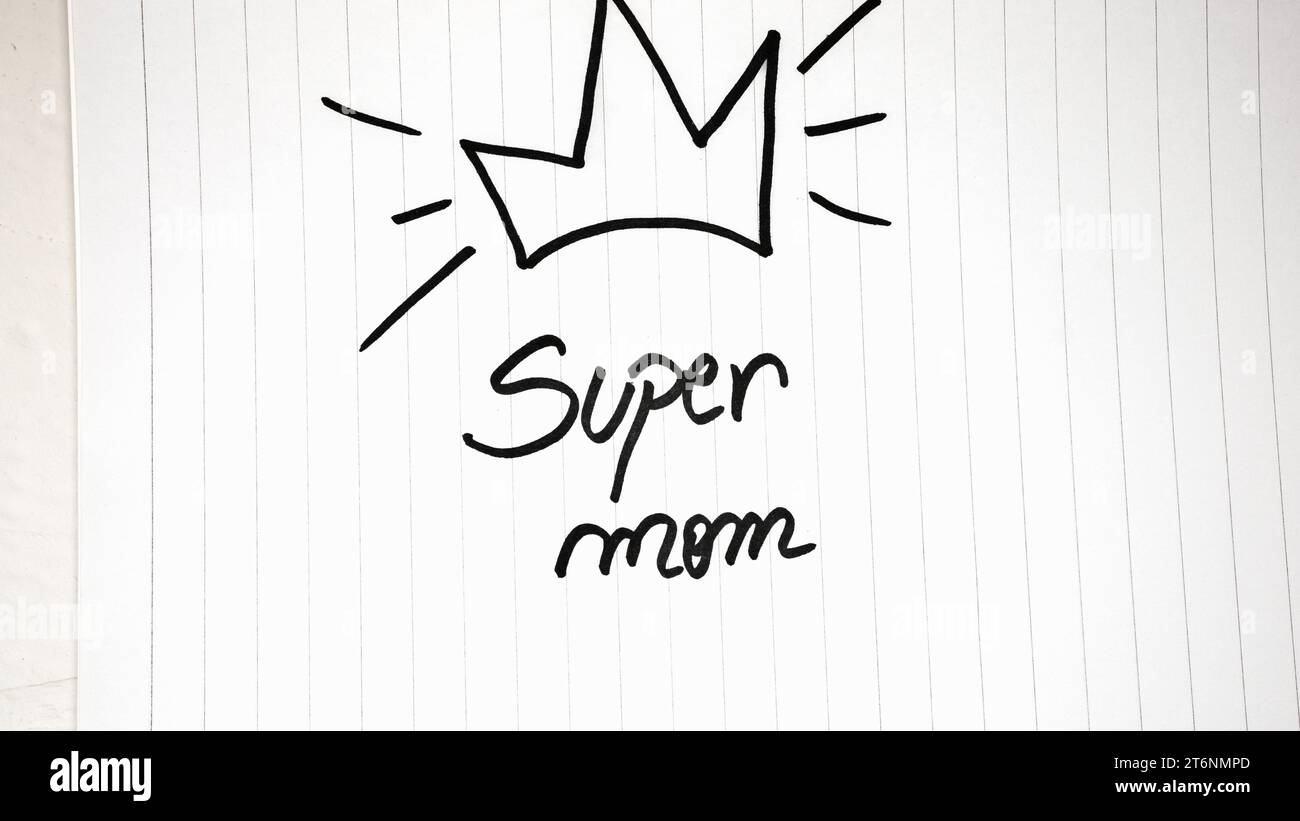 Crown drawing and super mom writing love text for mother on paper ...