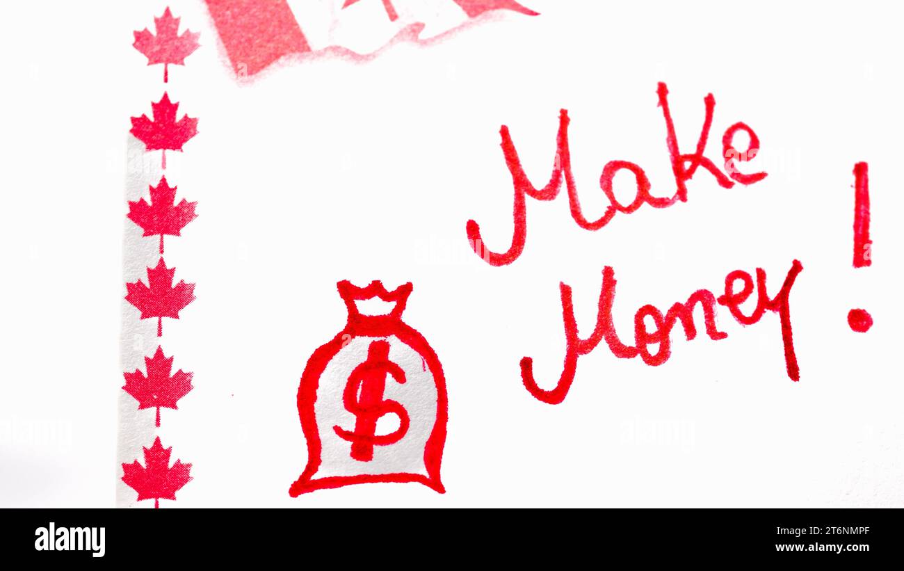 Make money handwriting on paper with Canada flag. Writing text on memo ...