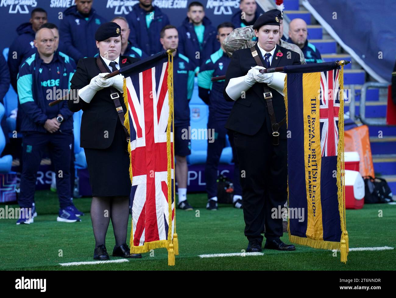 Standard-bearers lower flags for a moment of reflection for Remembrance ...