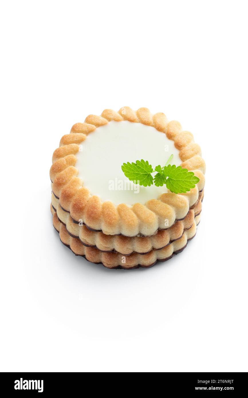 Stack of cream filling biscuits isolated on white Stock Photo - Alamy