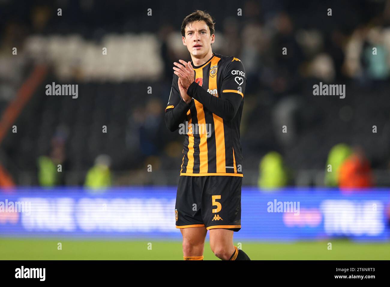 Alfie Jones of Hull City shows his appreciation to the home fans during ...