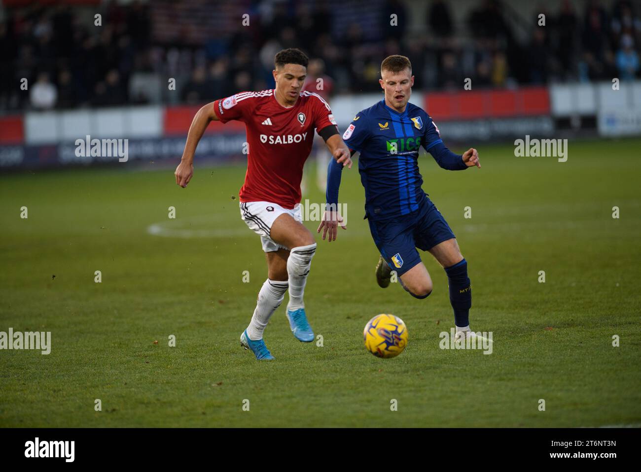 Salford City's Ethan Ingram under pressure from Mansfield Town's Calum ...