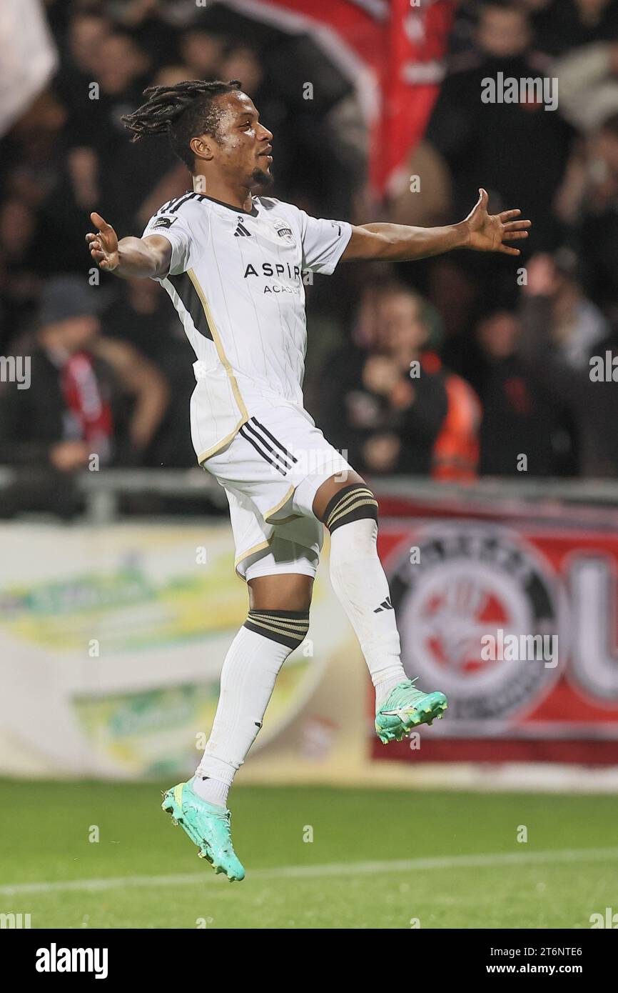 Eupen's Isaac Nuhu celebrates after scoring during a soccer match ...