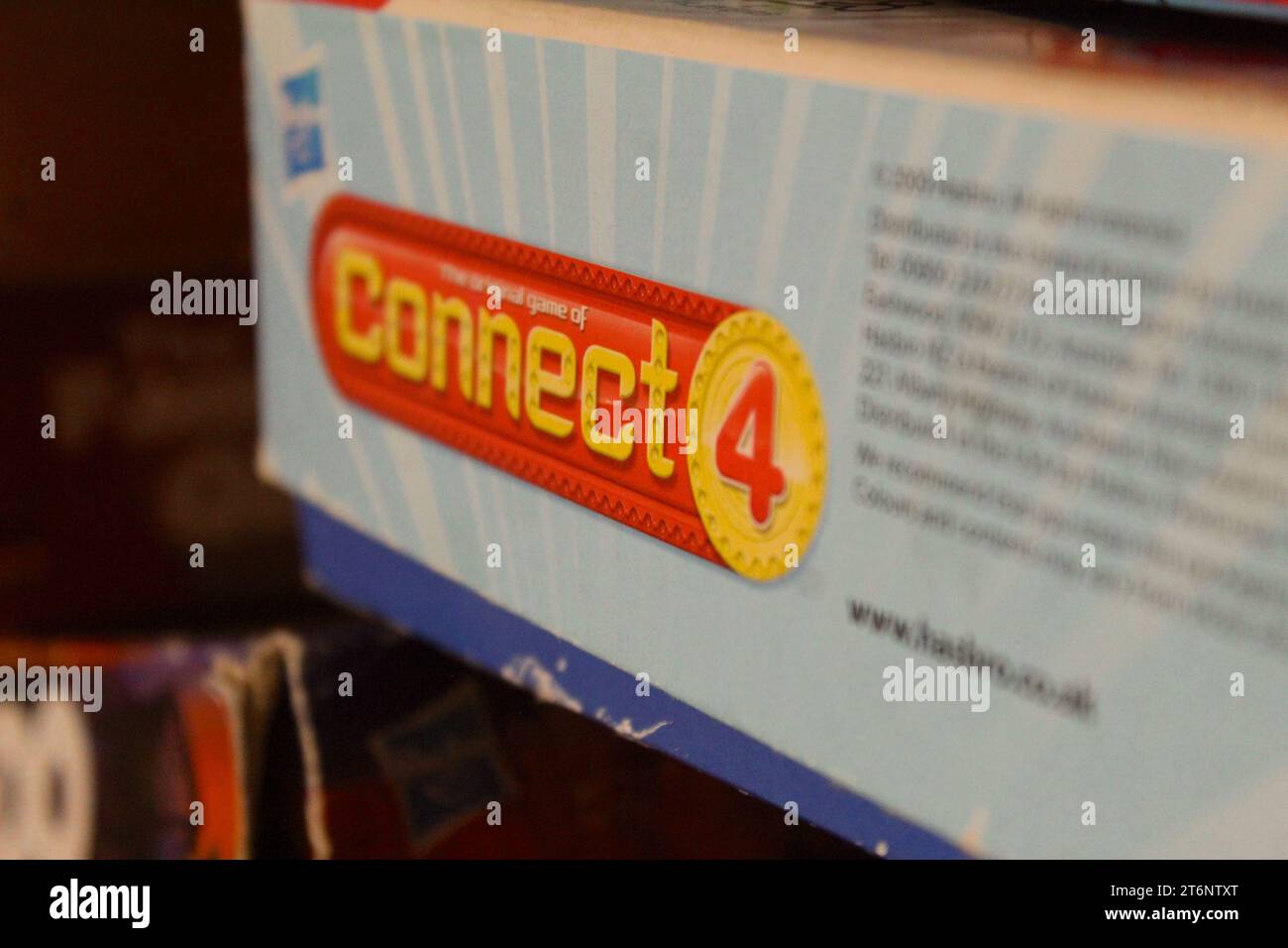 A photo of the Connect 4 board game logo on the outside of the box ...