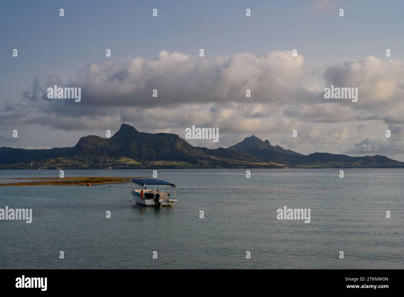 Mauritius East Coast of the Indian Ocean with a Small Tourist Boat near ...
