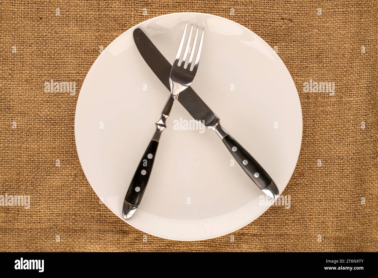Cutlery on jute cloth hi-res stock photography and images - Alamy