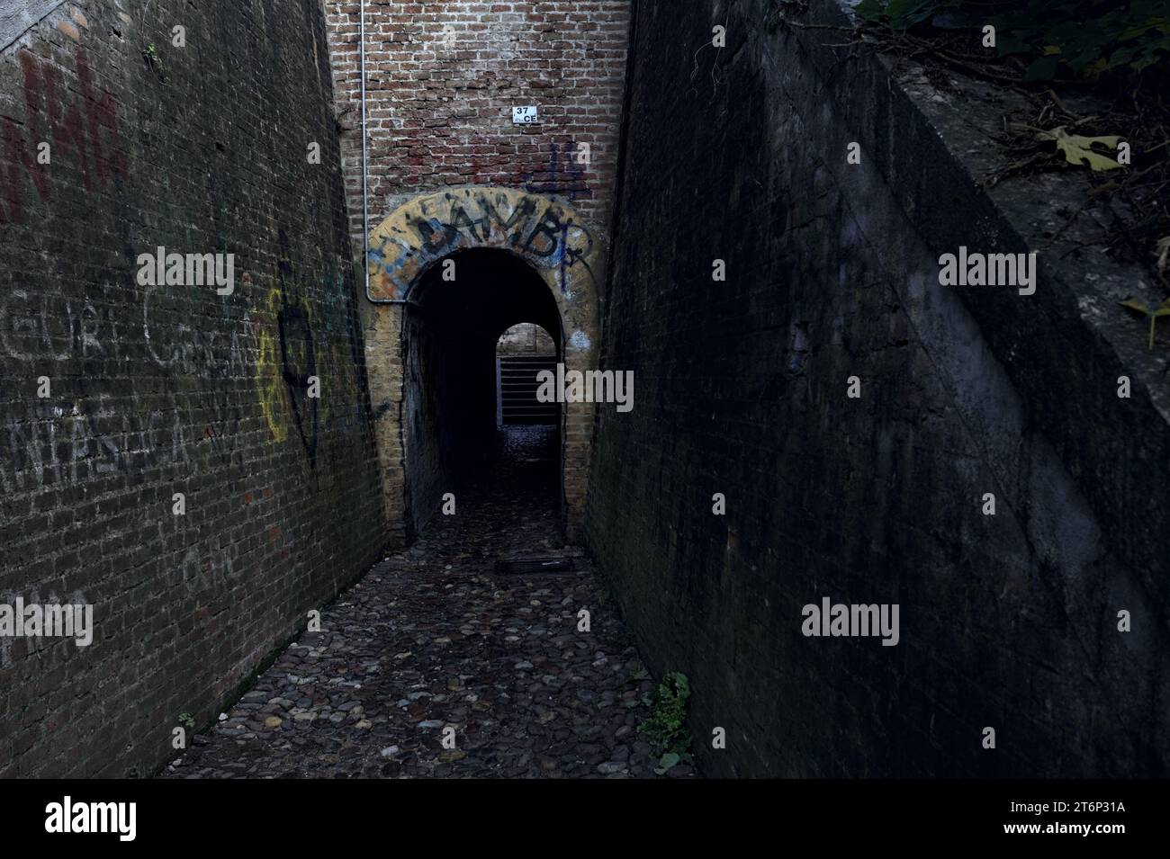 Dark tunnel underpass alone dim hi-res stock photography and images - Alamy