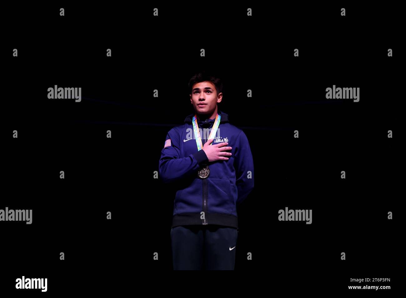 USA’s Ruben Padilla sings his national anthem on the podium after ...