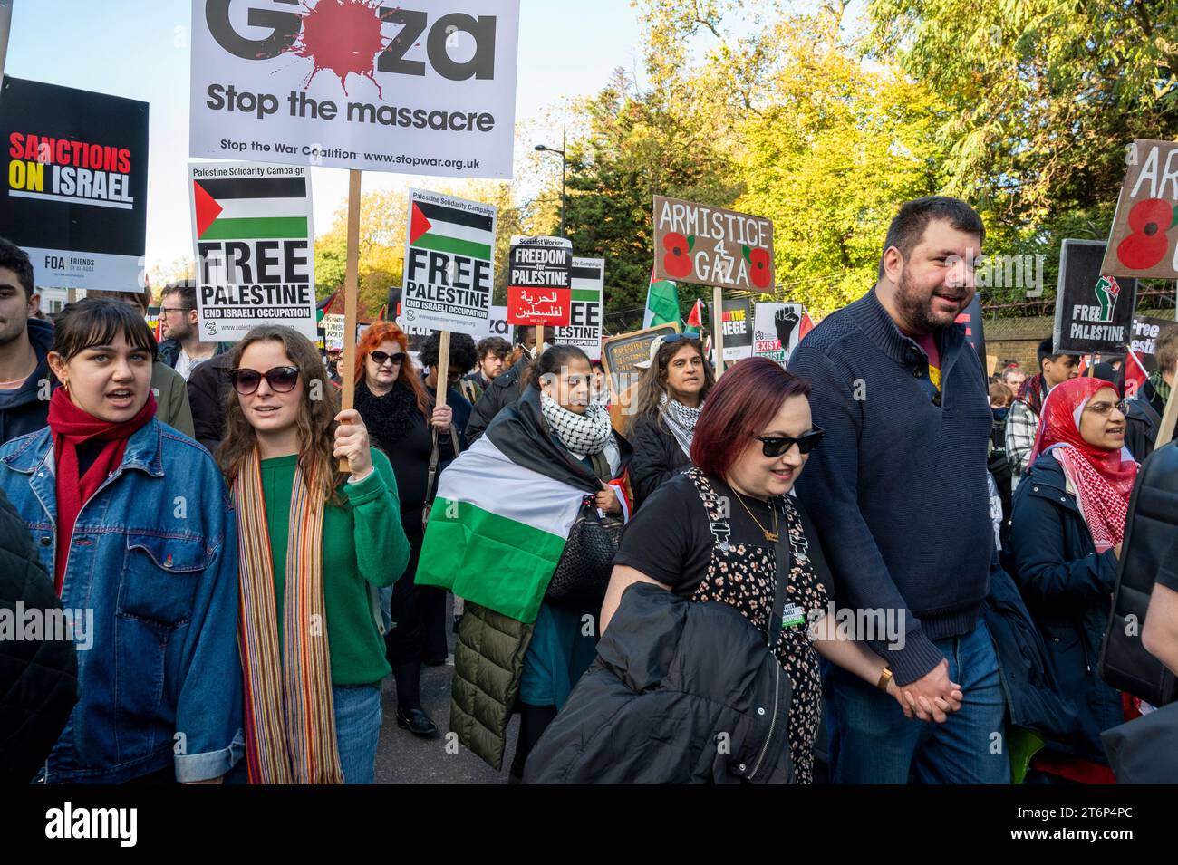 Protest against the war on Gaza with placards "Gaza stop the massacre ...
