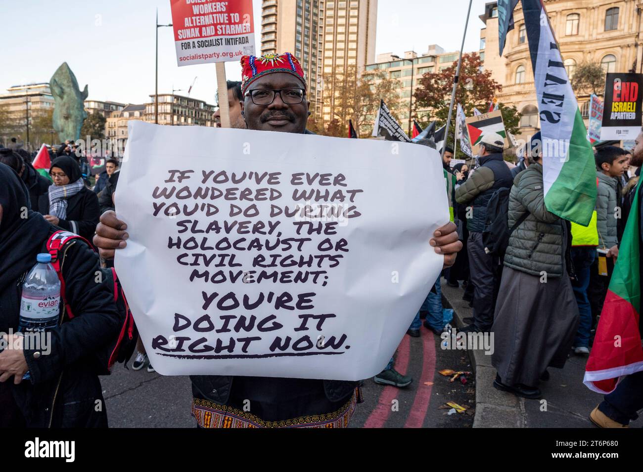 Protest against bombing Gaza. Placard "if you've ever wondered what you ...