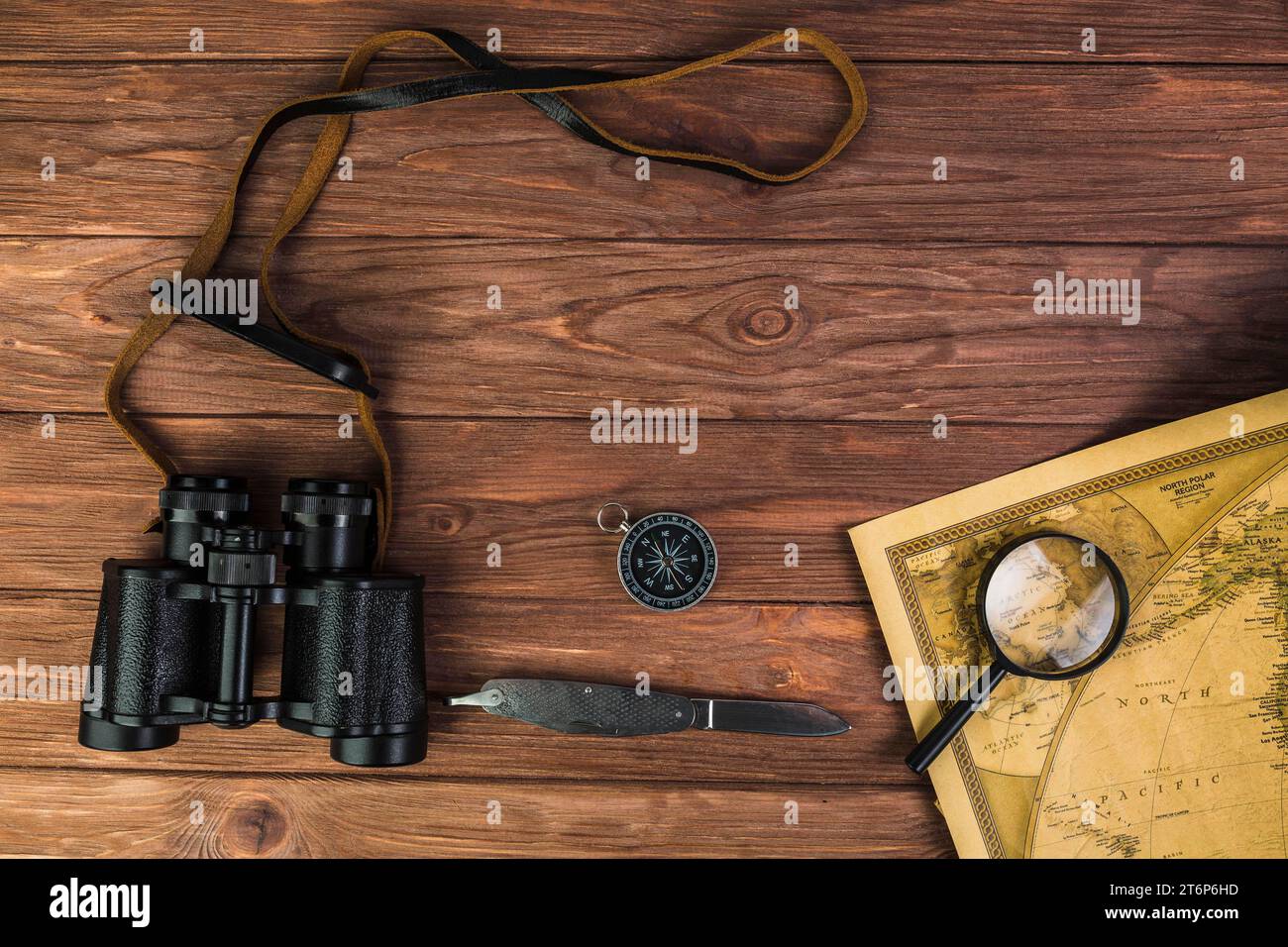 Binocular compass knife with microscope vintage map Stock Photo - Alamy