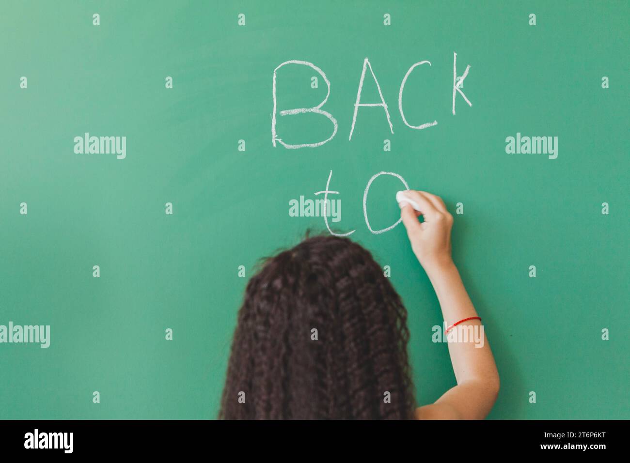 School girl writing chalk hi-res stock photography and images - Alamy