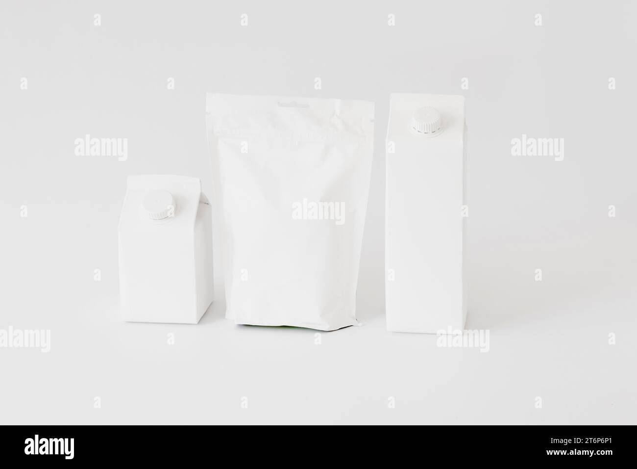 Carton paper packages bottles dairy produce Stock Photo - Alamy