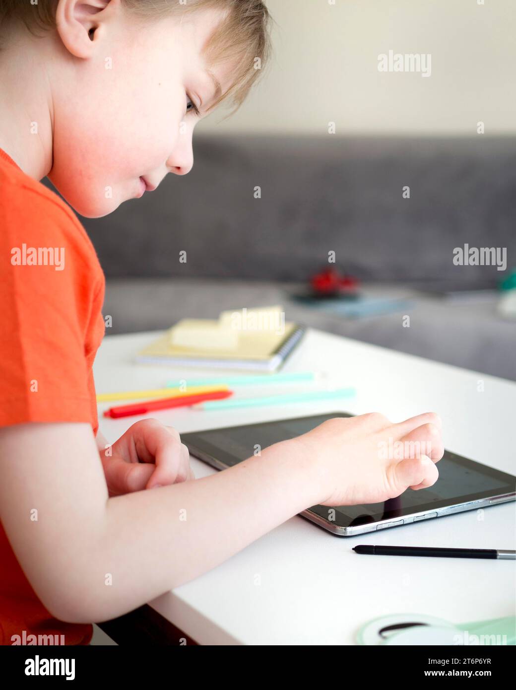 Child learning new information from digital tablet Stock Photo - Alamy