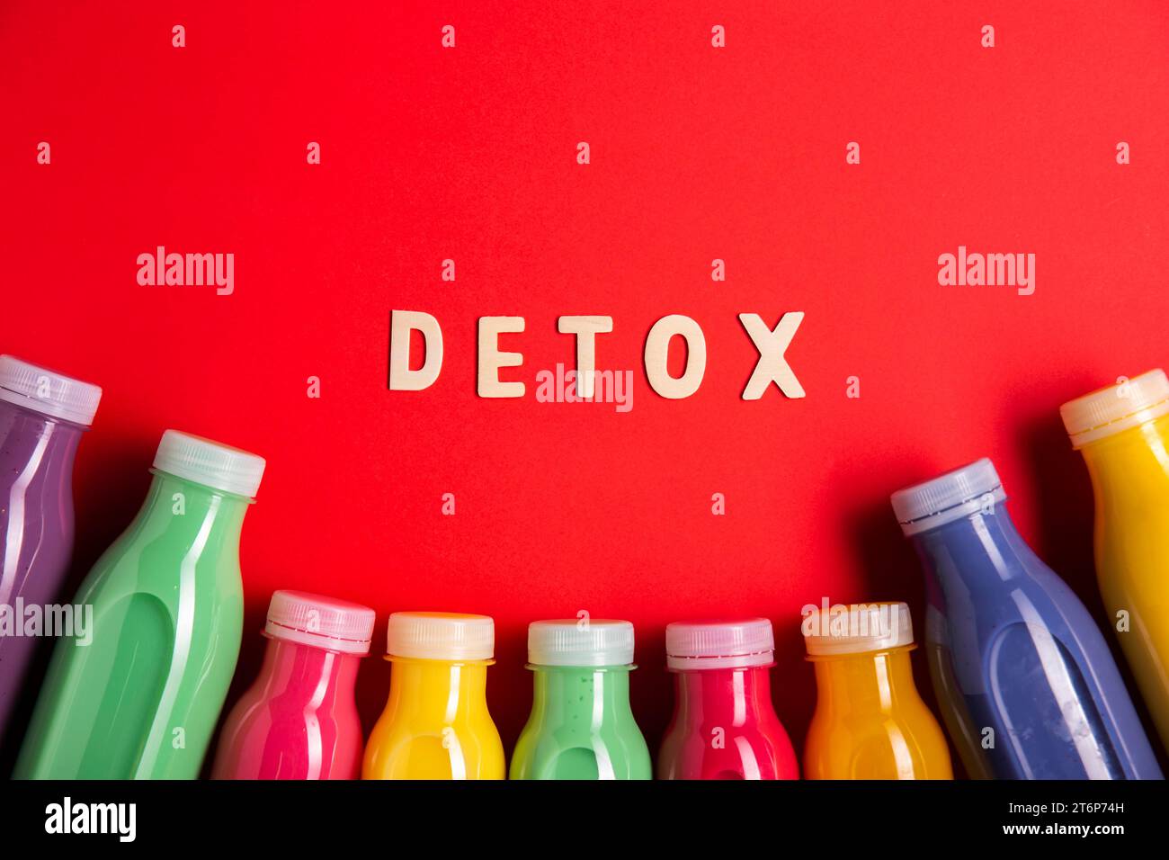 Colorful smoothies with detox lettering Stock Photo - Alamy