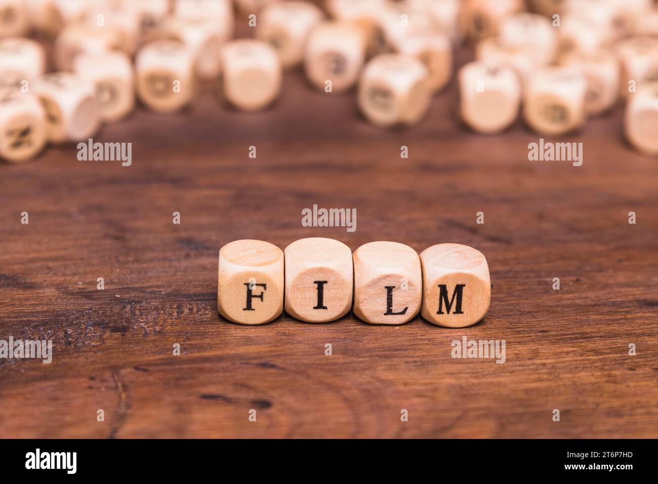 Film word written wooden cubes Stock Photo - Alamy