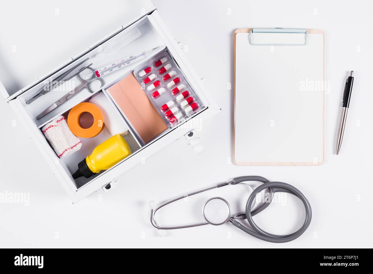 First aid kit with clipboard stethoscope pen white background Stock ...