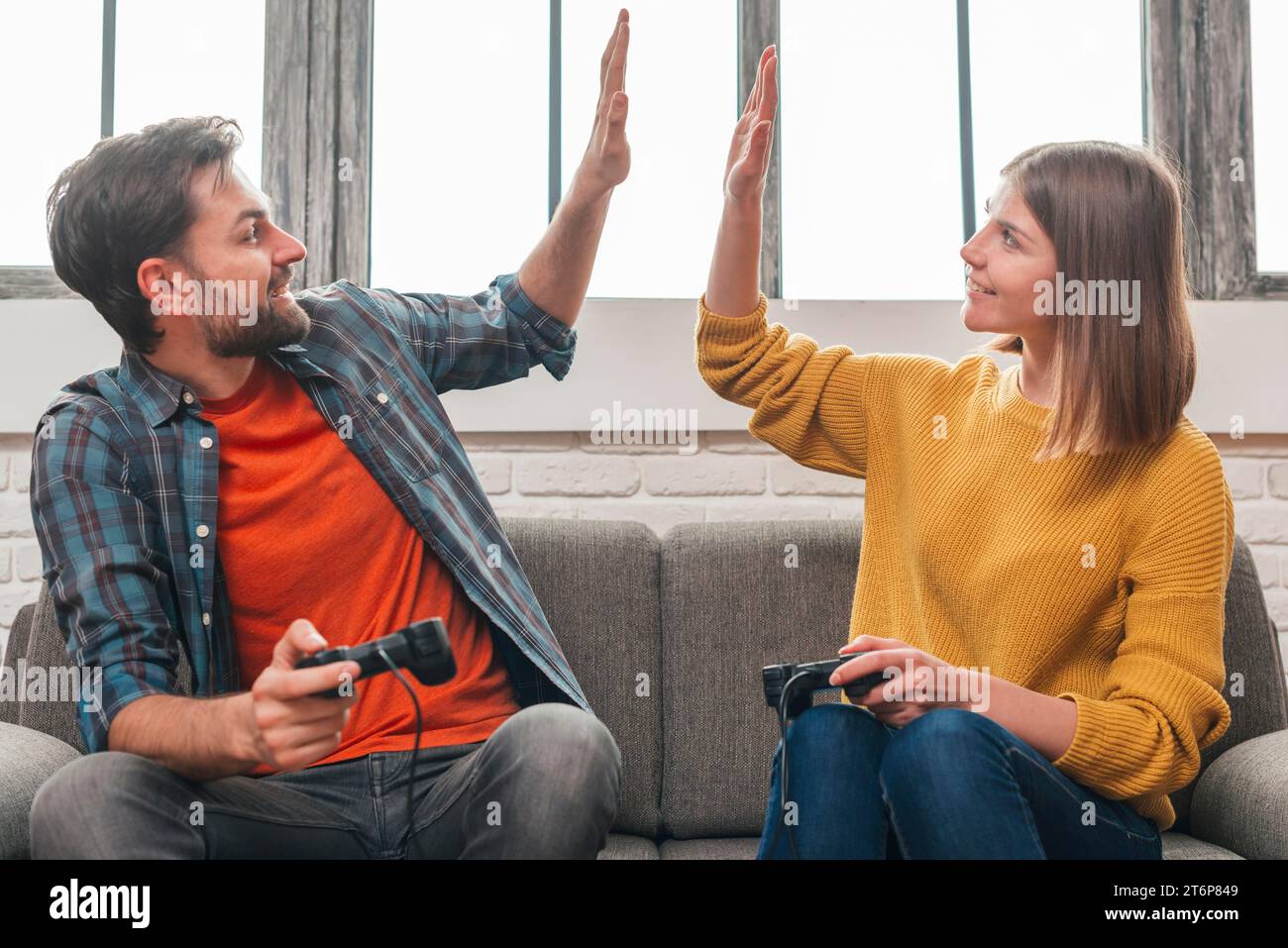 Digital high five hi-res stock photography and images - Alamy