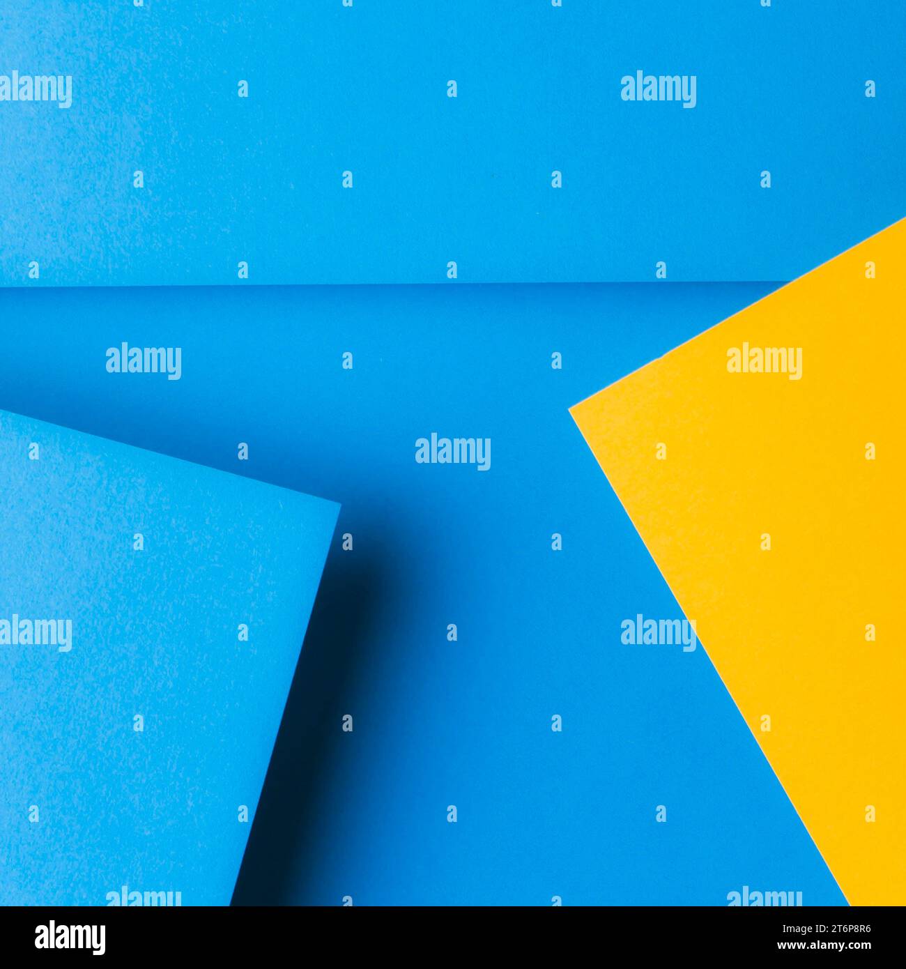 Overhead view pop up paper blue background Stock Photo - Alamy