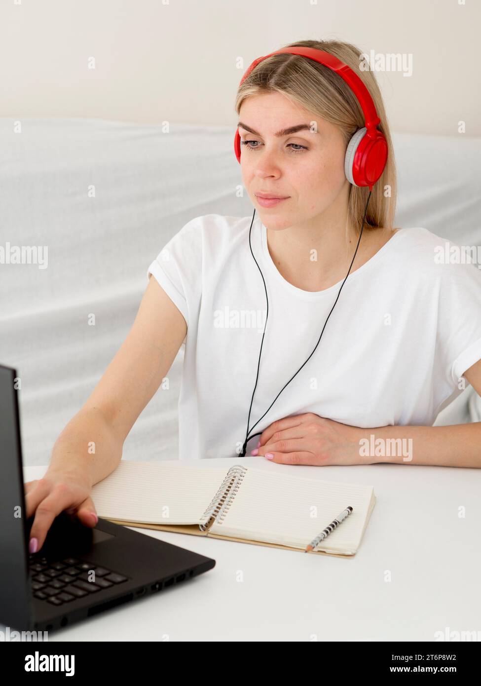 Online classes with student using her laptop Stock Photo - Alamy