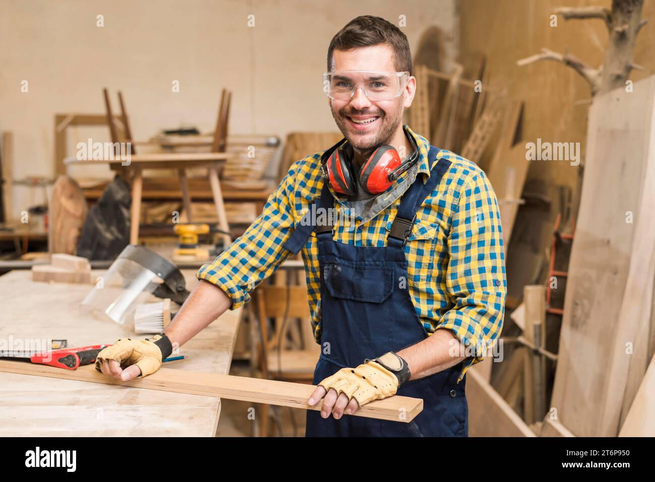 Portrait handsome craftsman looking camera hi-res stock photography and ...