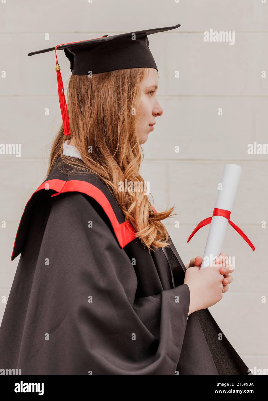 Side view graduated girl Stock Photo - Alamy