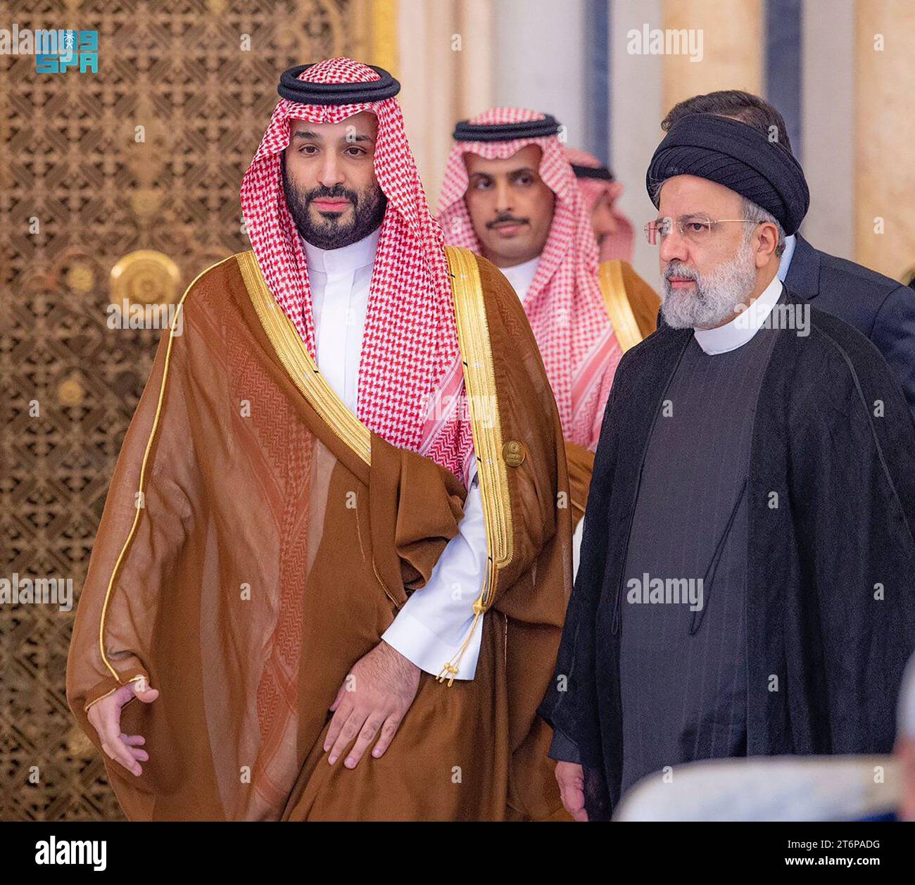 Saudi Crown Prince Mohammed bin Salman (L) talks with Iran's President ...