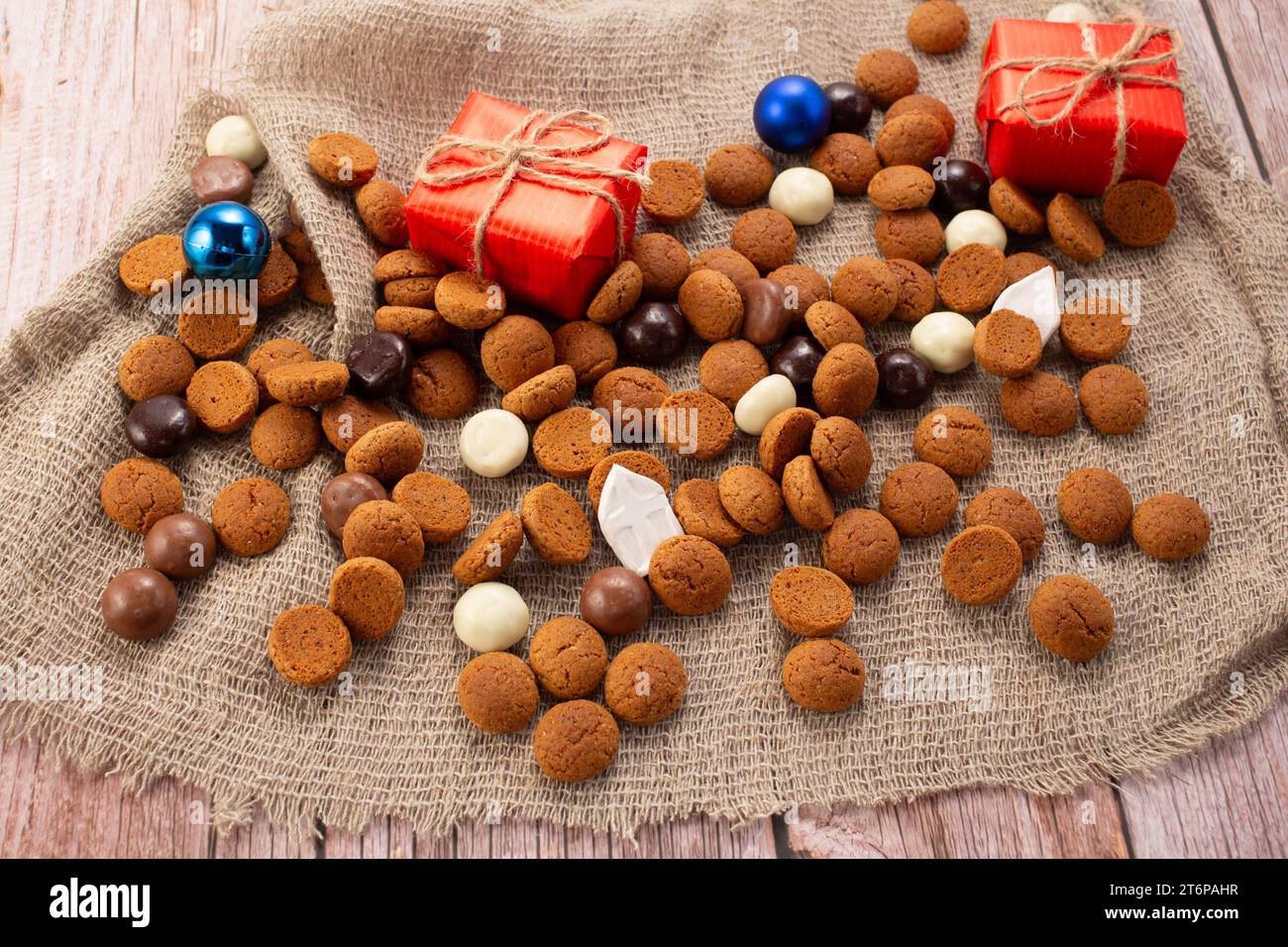 Dutch holiday Sinterklaas background with traditional sweets pepernoten ...