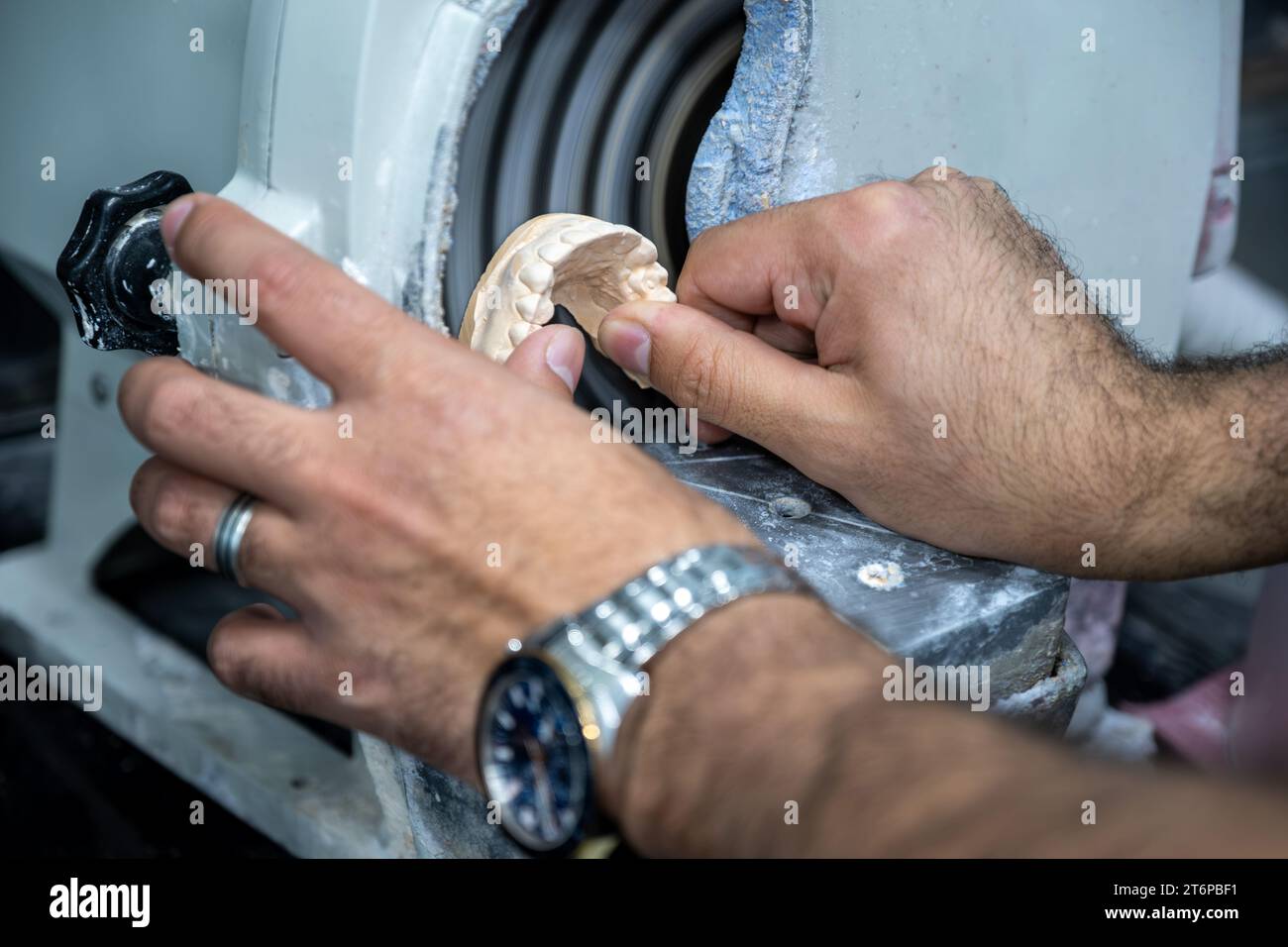 Grinding and sawing the teeth crowns holder prototype to be used in ...