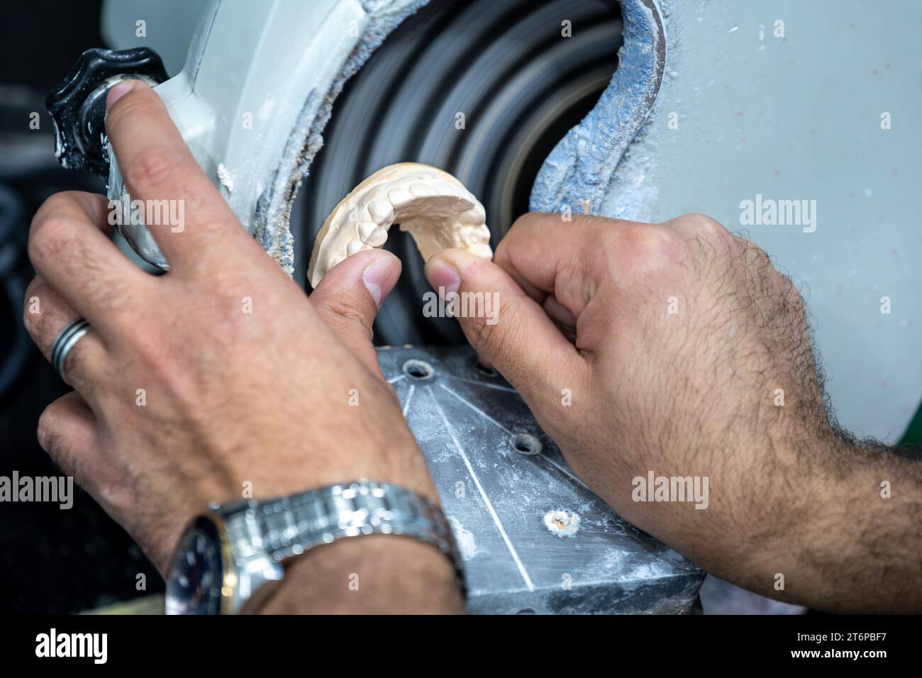 Grinding and sawing the teeth crowns holder prototype to be used in ...