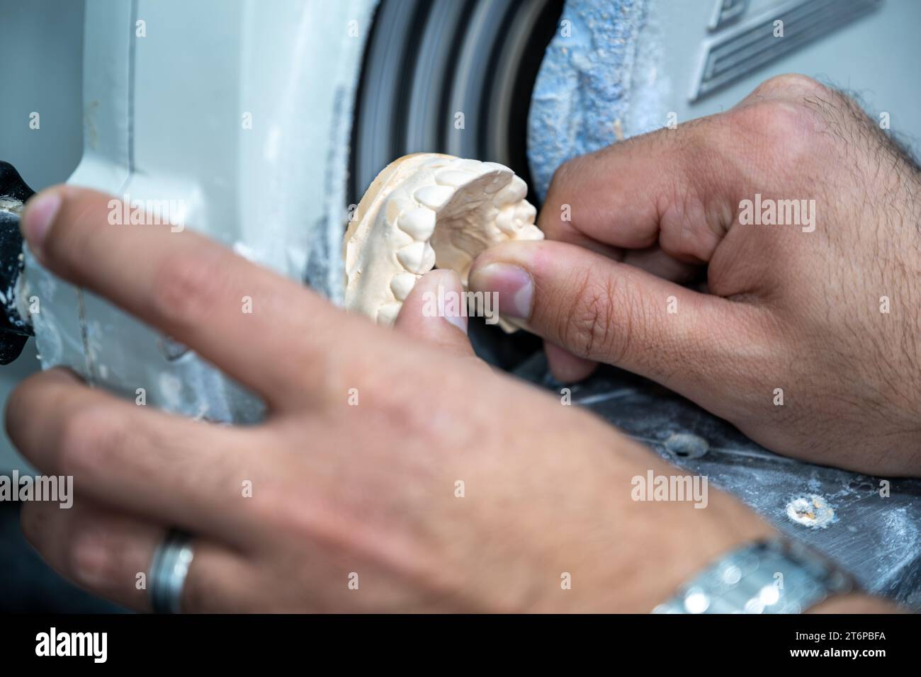 Grinding and sawing the teeth crowns holder prototype to be used in ...