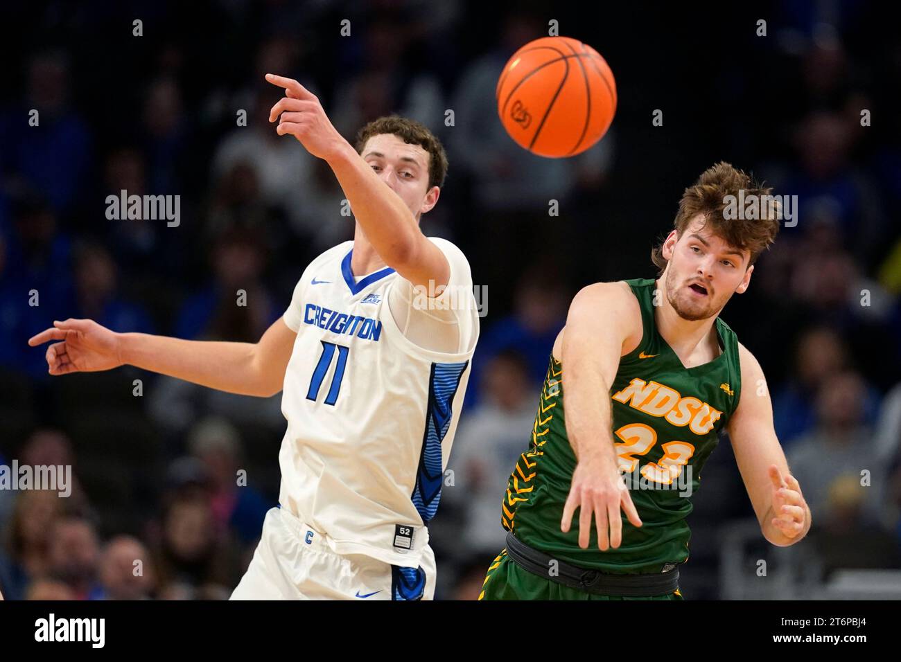 Creighton center Ryan Kalkbrenner (11) fights for a rebound with North ...