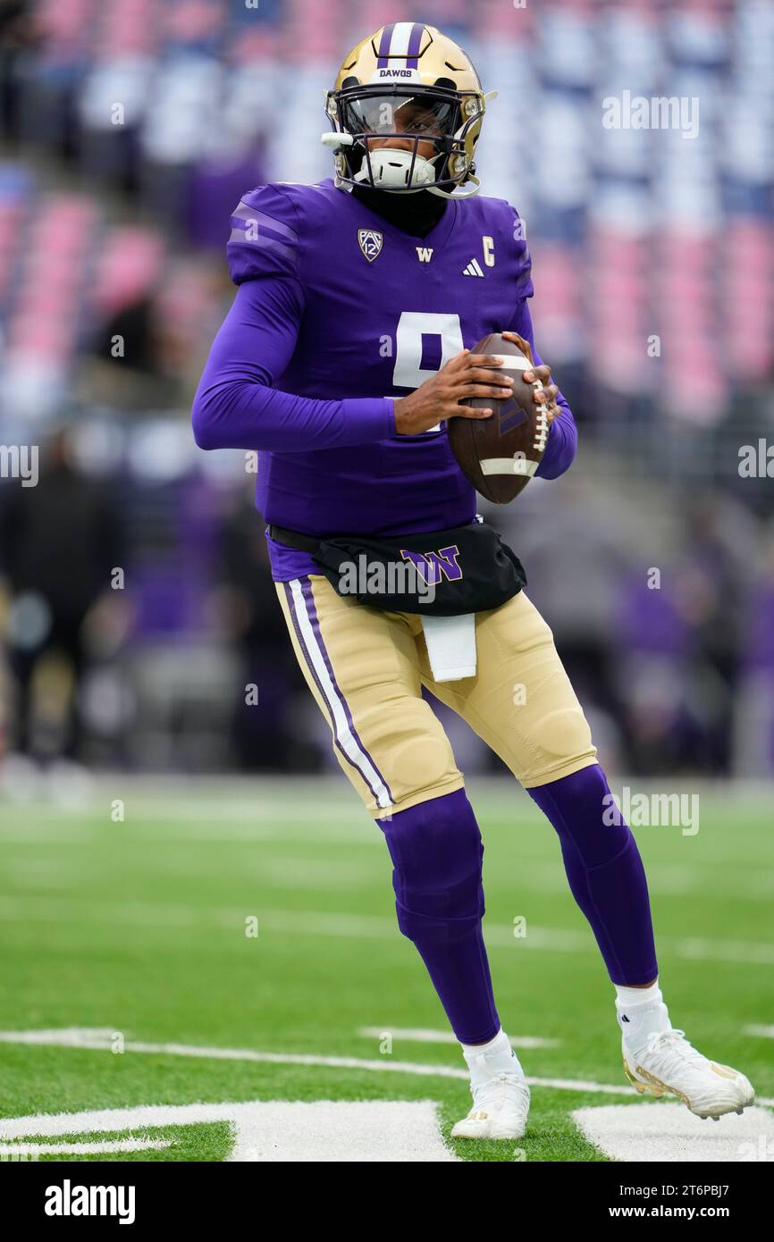 Washington quarterback Michael Penix Jr. (9) warms up before an NCAA college football game ...