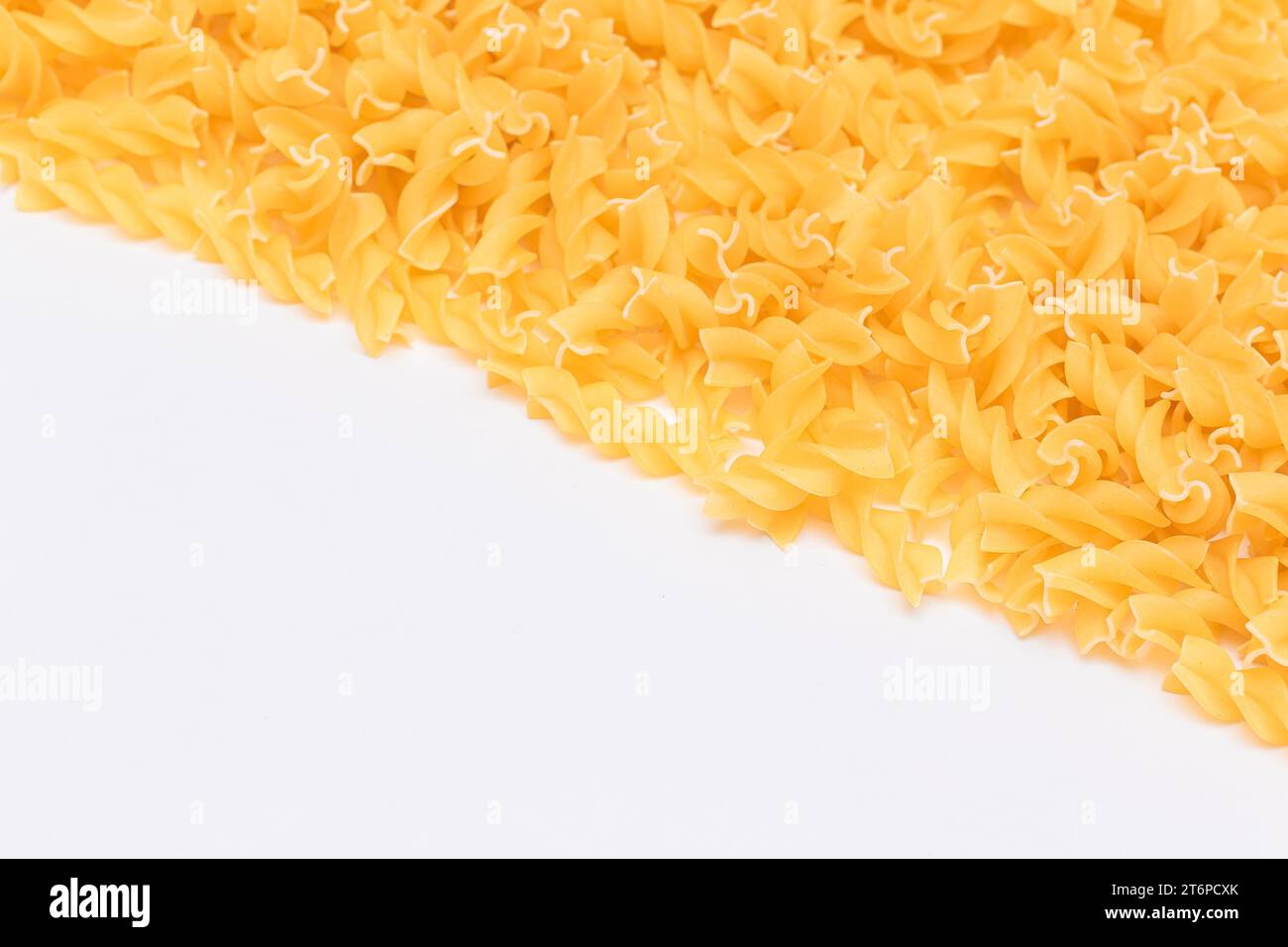 Uncooked Fusilli Pasta with Copy Space on White Background. Raw and Dry ...