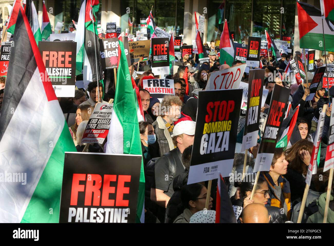 Protesters hold placards expressing their opinion during the ...