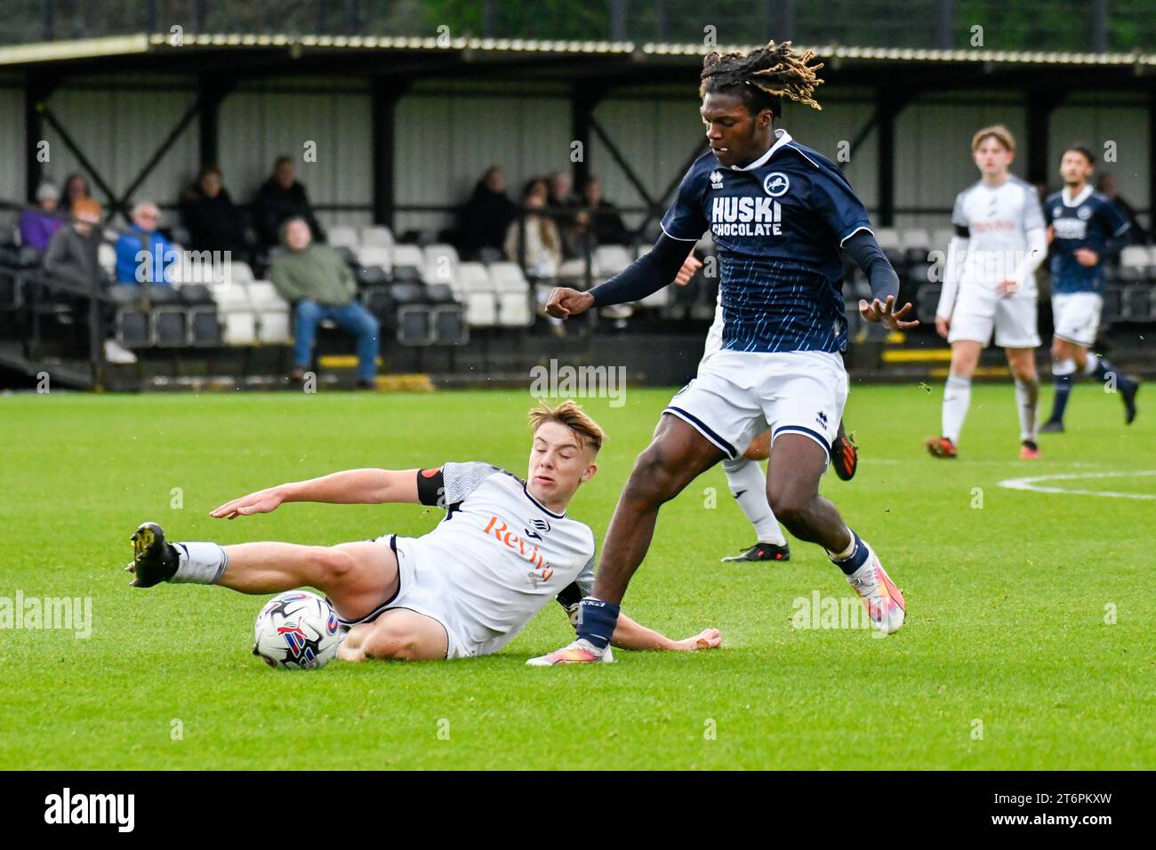 Swansea, Wales. 11 November 2023. Kavalli Heywood of Millwall (right ...