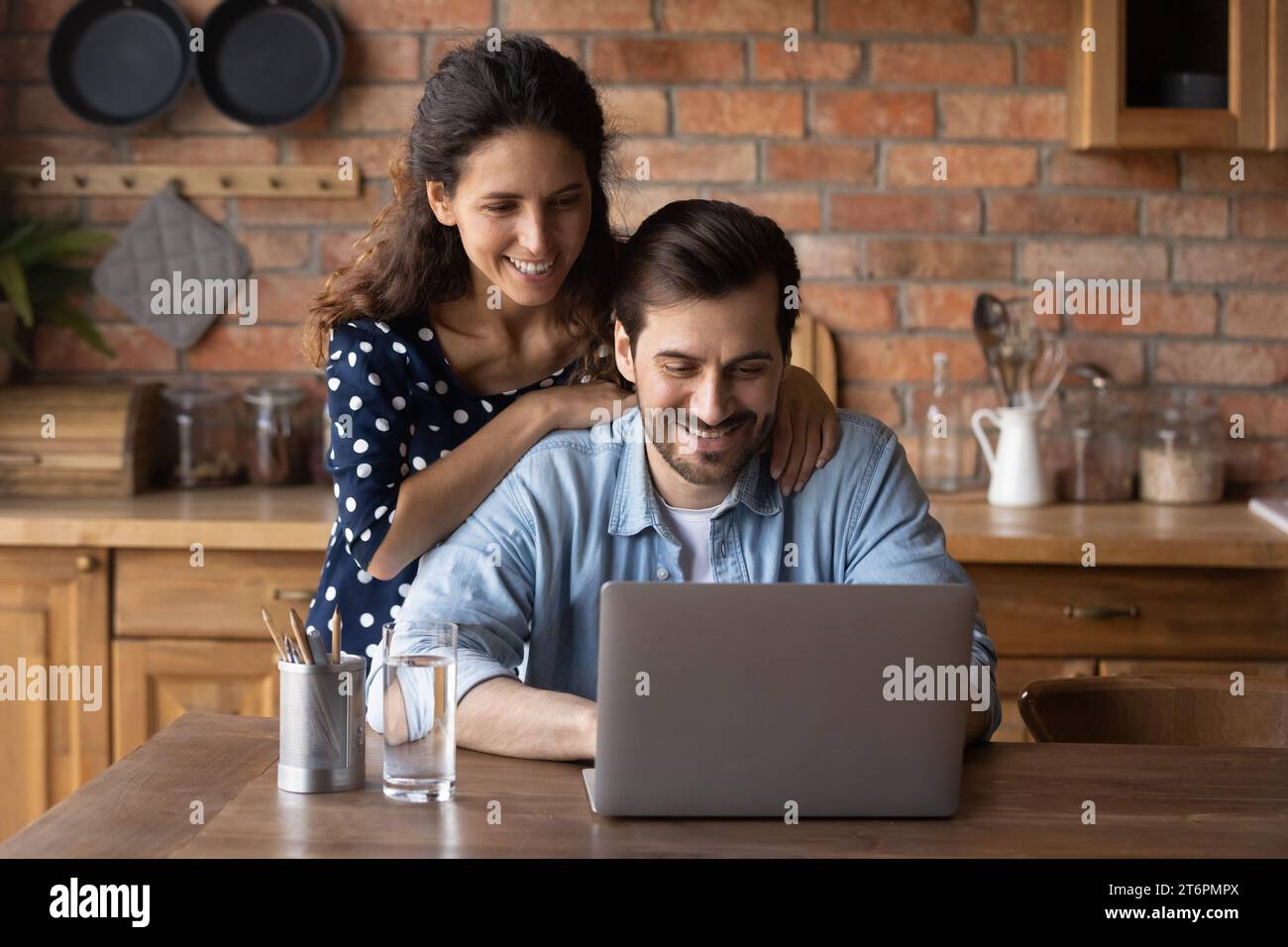 Woman man computer kitchen hi-res stock photography and images - Alamy