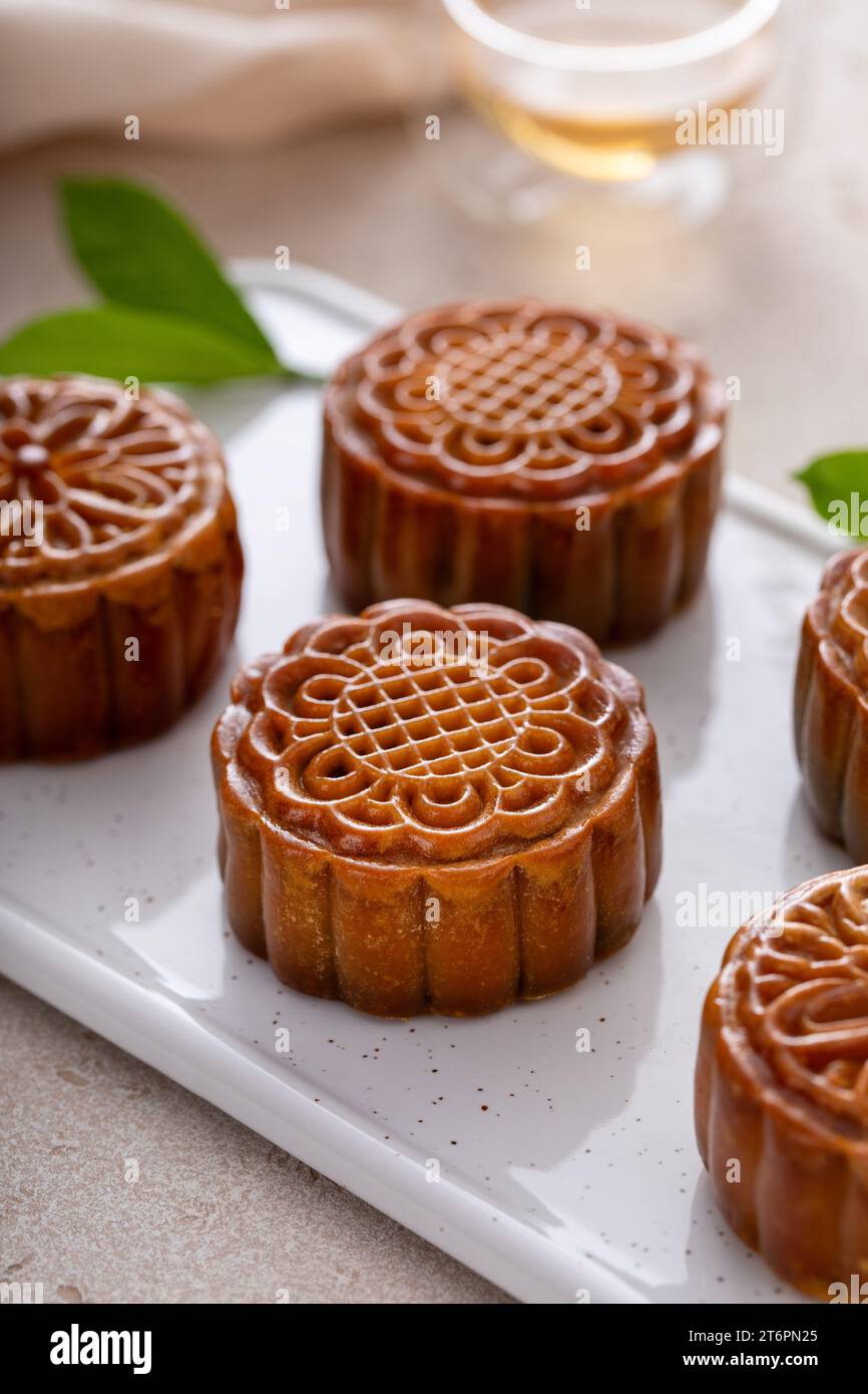 Traditional Chinese mooncakes for mid autumn festival with egg yolk and ...