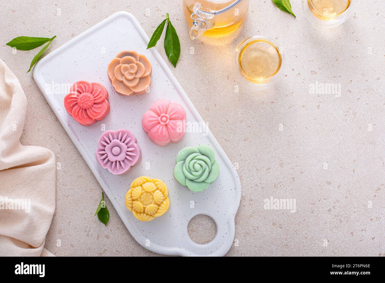 Traditional Chinese snow skin mooncakes for mid autumn festival with fruit, taro and matcha ...