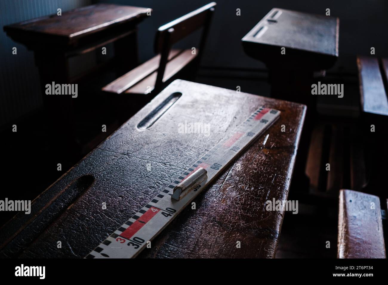 A metric ruler on a desk from another era, made of wood, vintage Stock ...