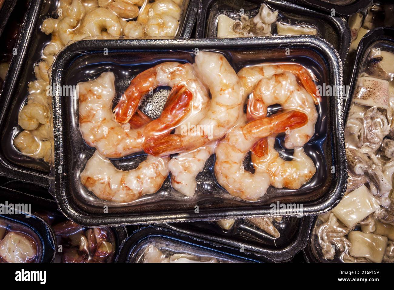 Shrimp tails in vacuum trays sealed for sous vide cooking for sale in ...