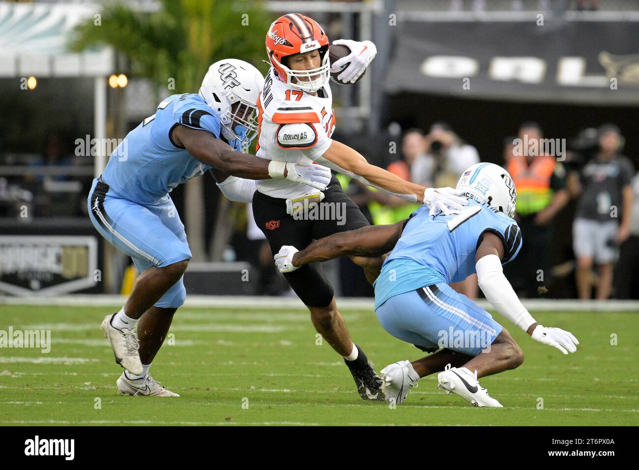 Oklahoma State wide receiver Leon Johnson III (17) is tackled by ...