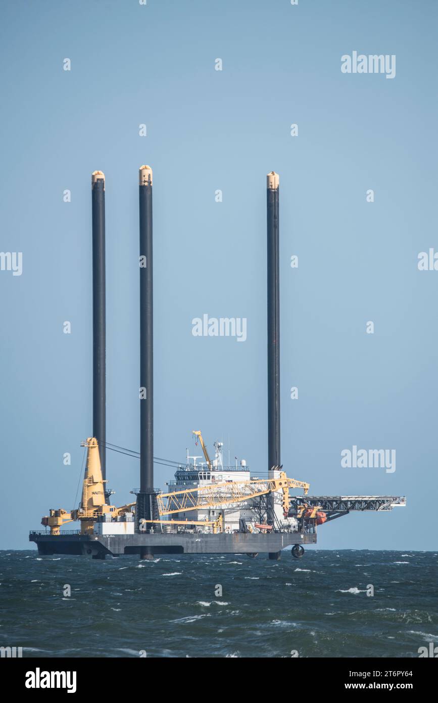 Unassigned oil drilling derricks rest offshore at Corpus Christi, Texas ...