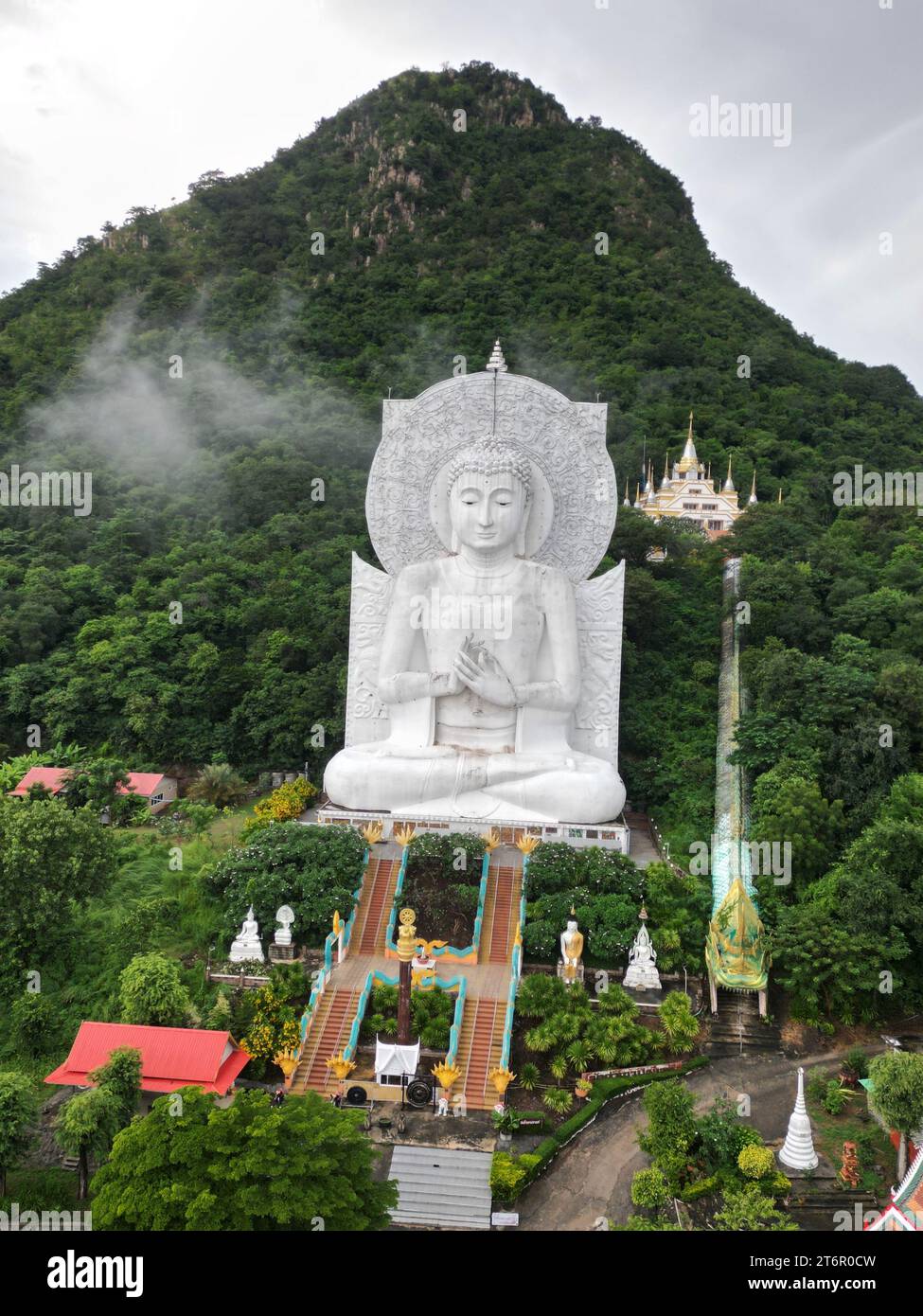 Buddha statue in the posture of giving the first sermon Or the ...