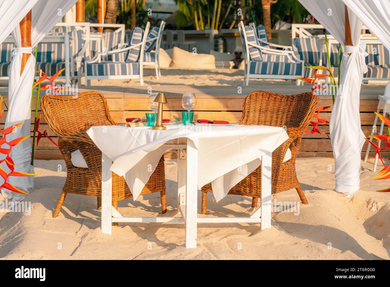 Luxury resort hotel outdoor restaurant on the beach, tropical island ...