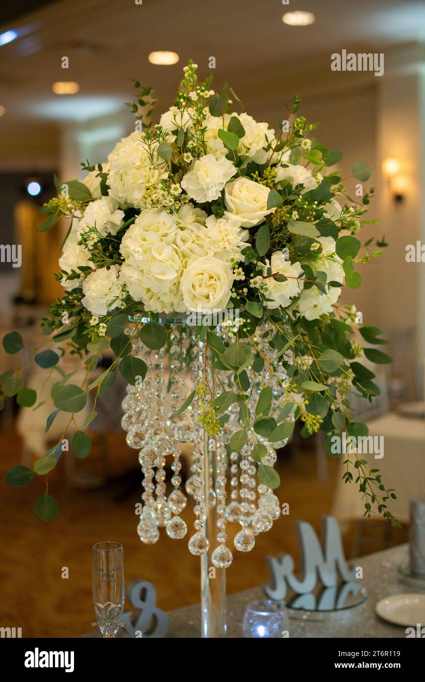 Beautiful bunch of white roses centerpiece with crystals at wedding ...