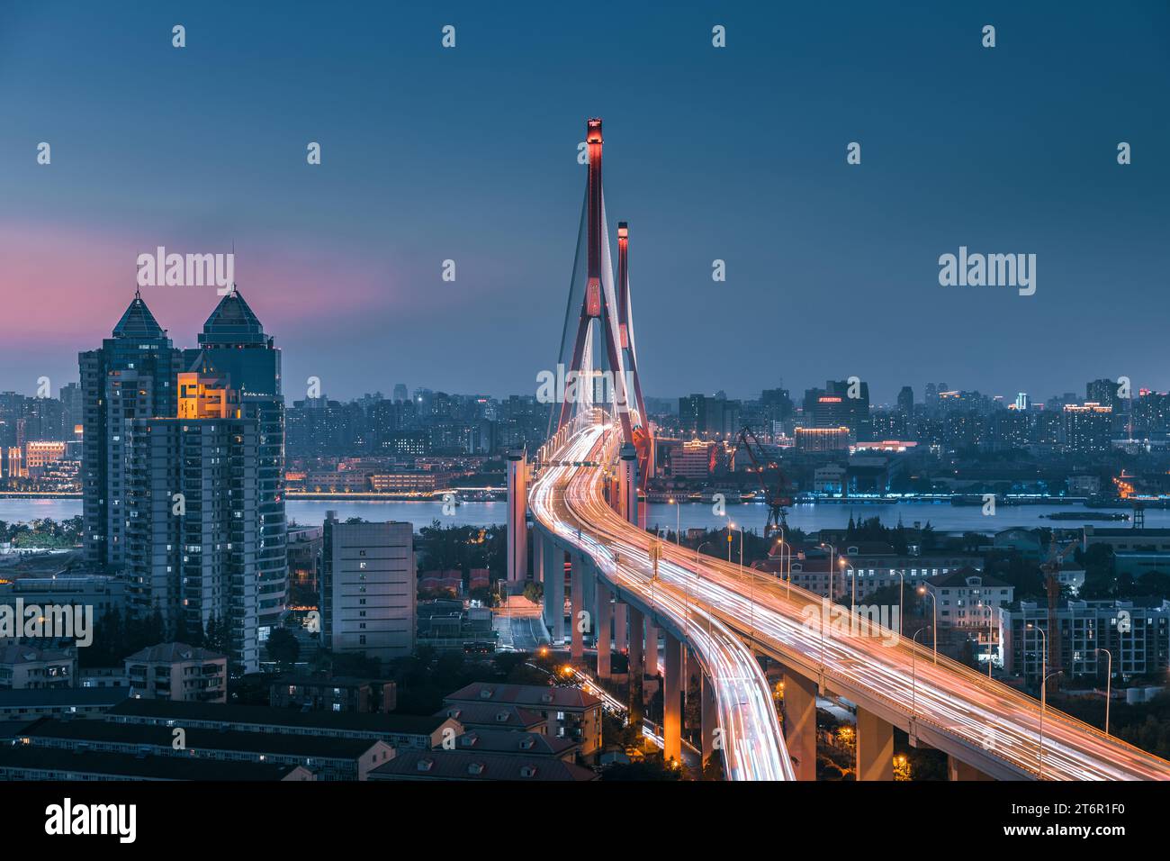 The illuminated Yangpu Bridge and skyline in Shanghai at night Stock ...